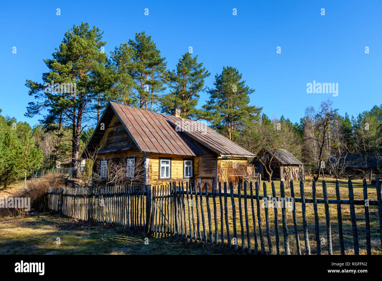 old wooden country house in the Russian outback village at dawn in the ...