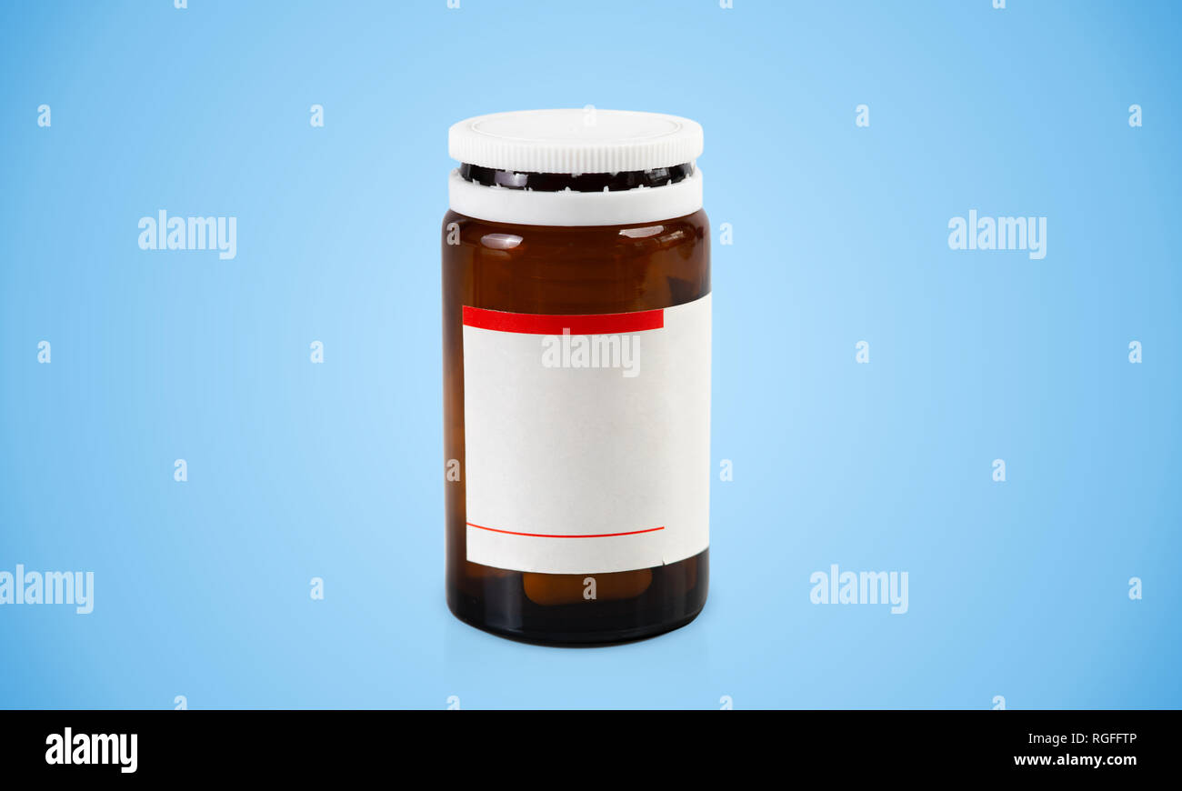 Medication and placebo concept. Close up of plastic brown vial with ...
