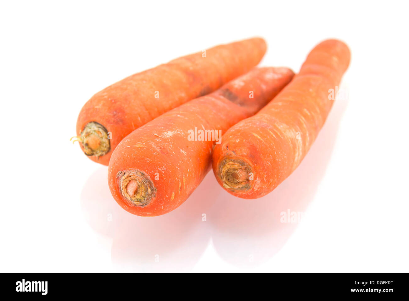 Rotten carrot isolated on white background Stock Photo - Alamy