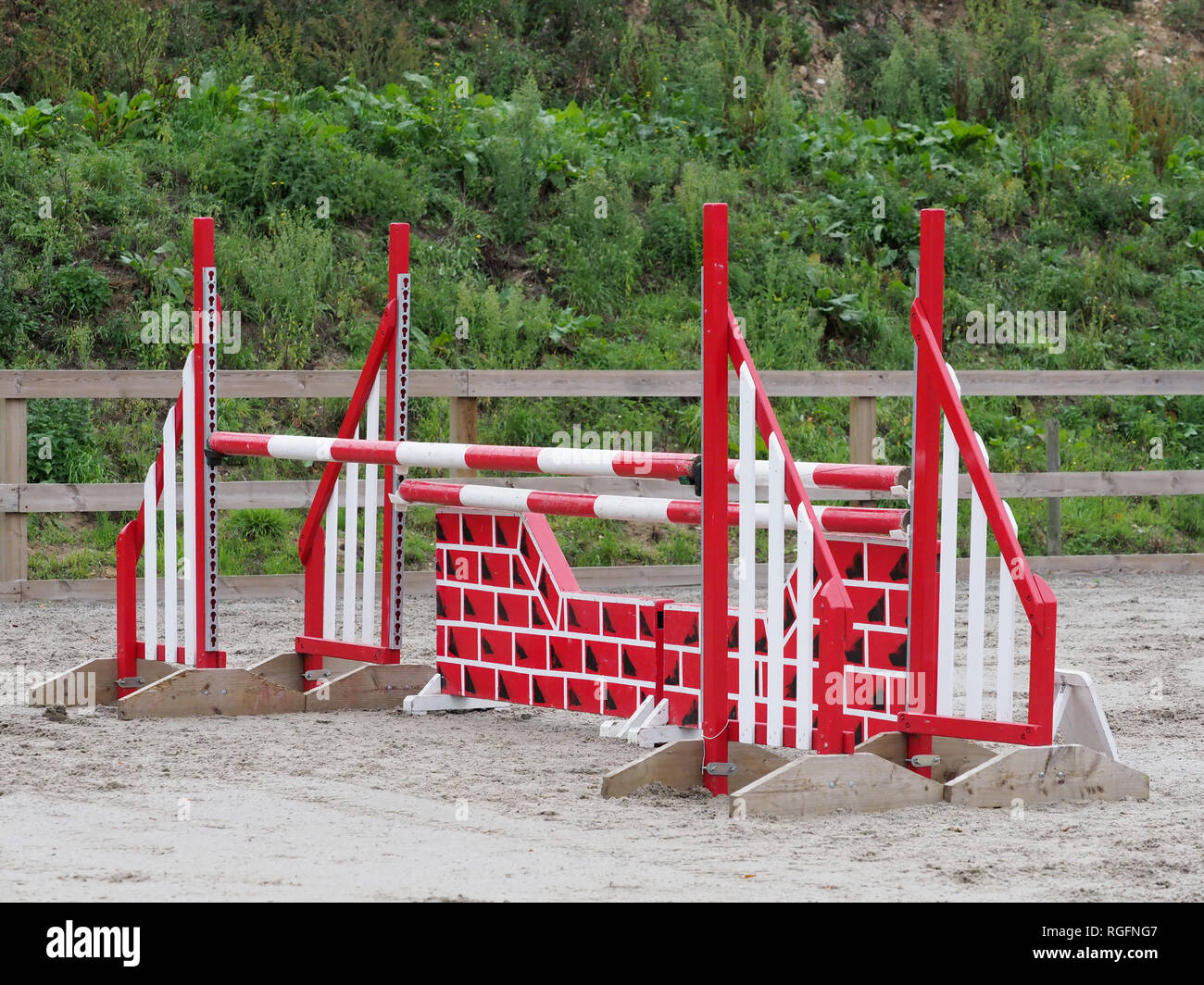 A single show jump fence in a typical riding arena Stock Photo - Alamy