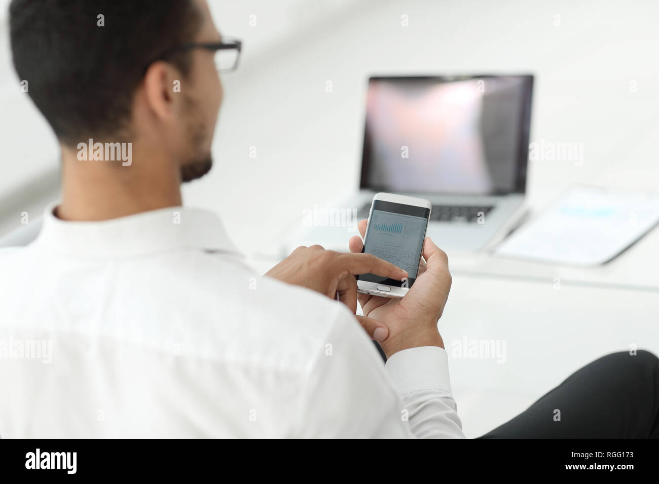 Using email on phone rear view hi-res stock photography and images - Alamy