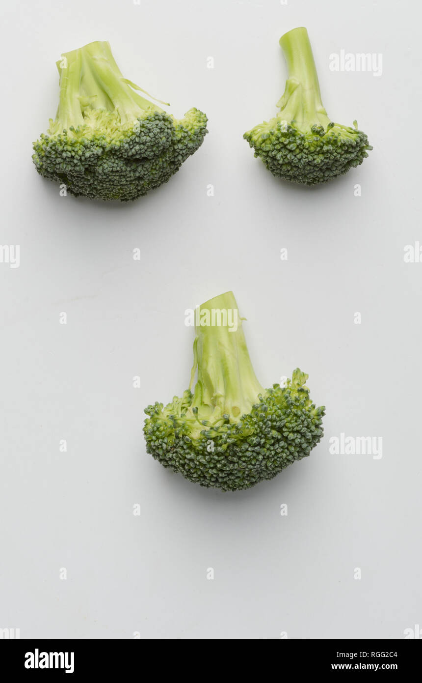 Three broccoli florets Stock Photo - Alamy