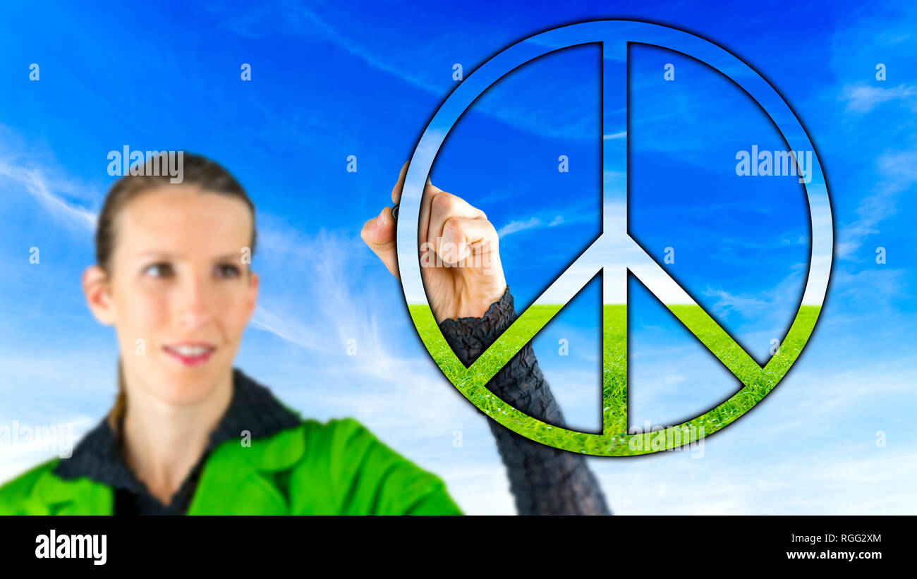 Woman drawing a peace sign against a blue sky depicting anti-war ...