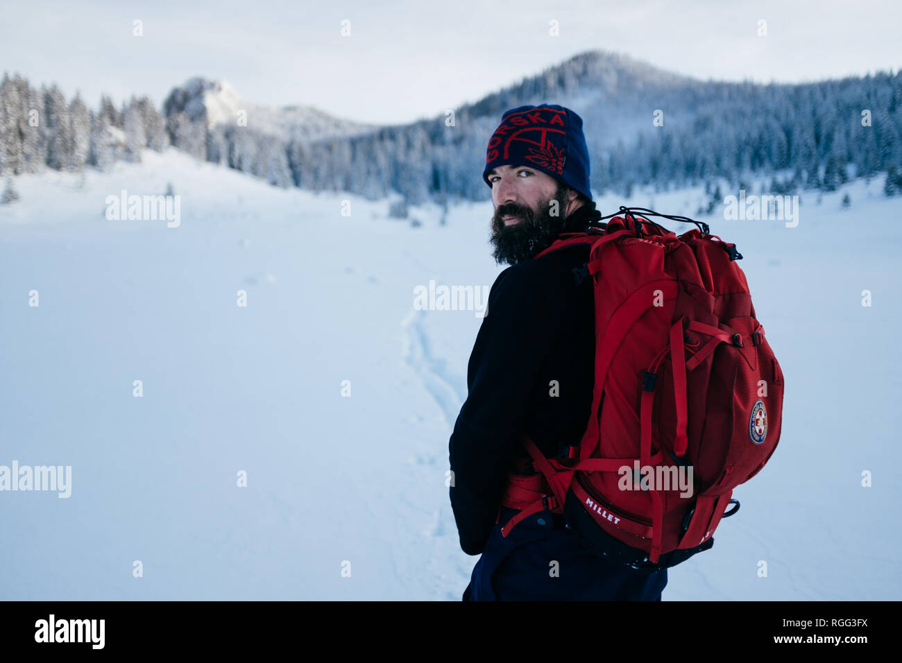 Mountain rescue man ski touring in remote mountains Stock Photo - Alamy