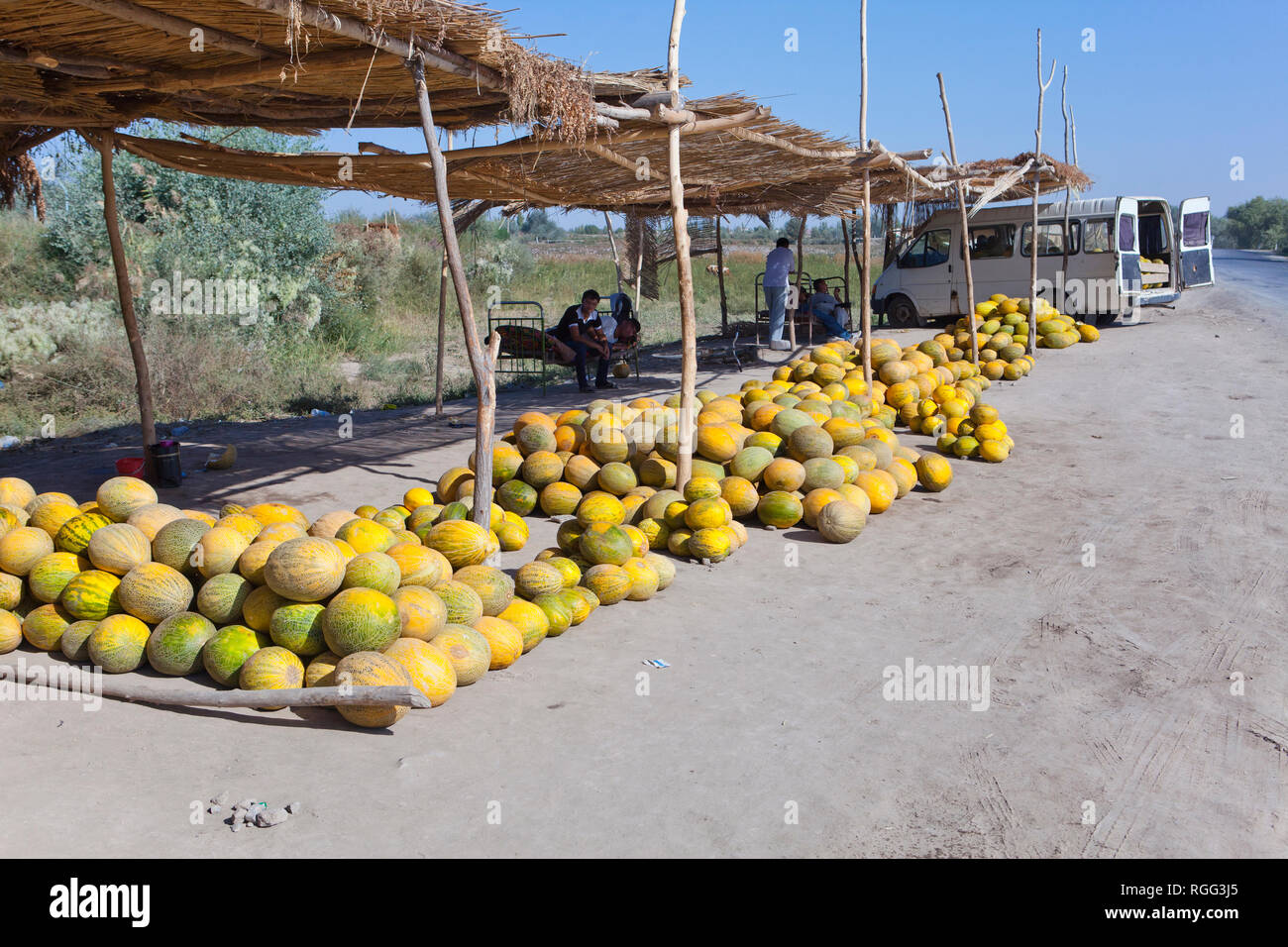Uzbekistan. Sale of melons by the road Stock Photo - Alamy