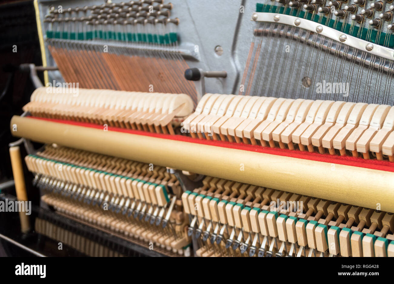 Close-up view of hammers and strings inside the piano Stock Photo - Alamy