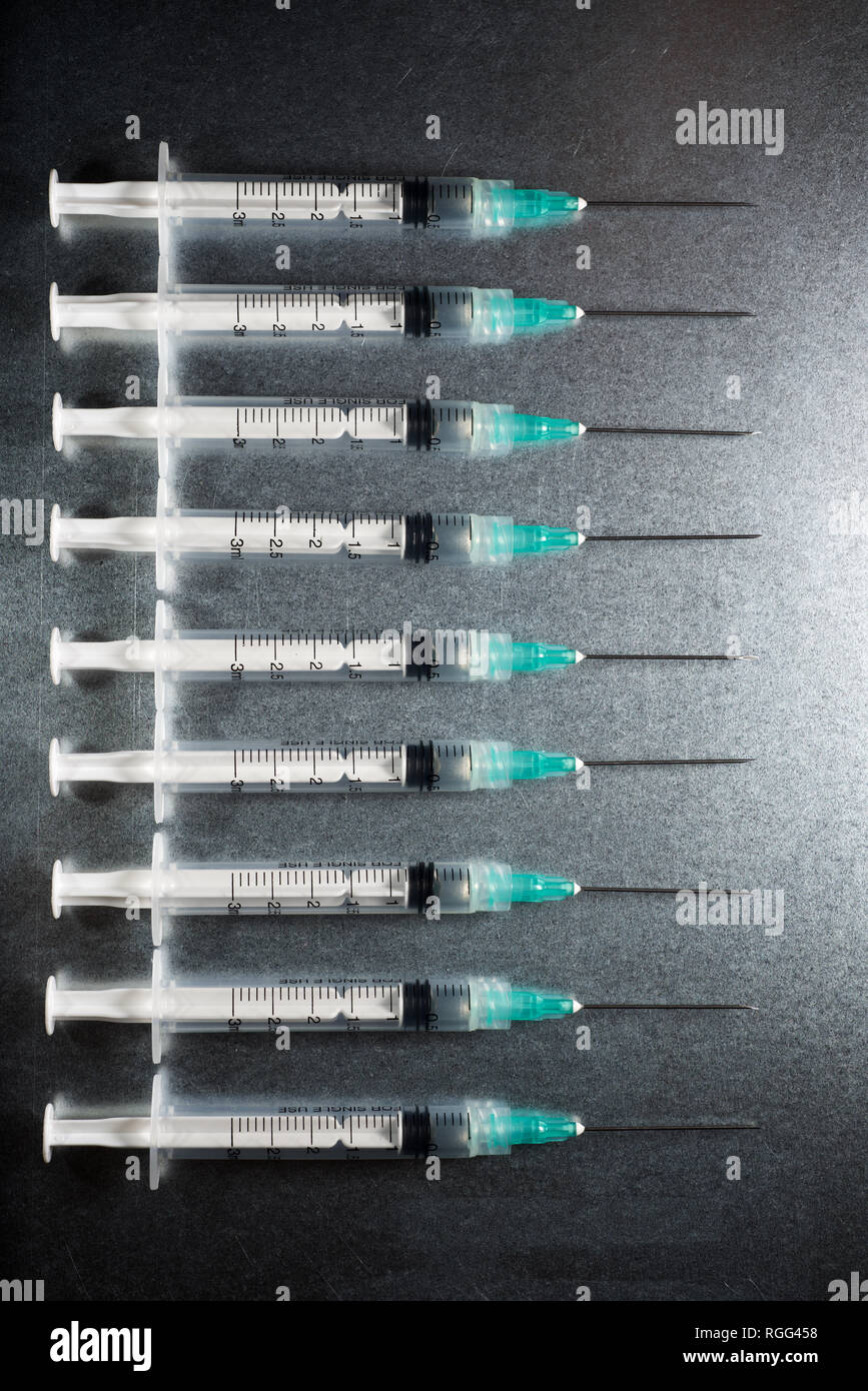 Close-up of a group of syringes Stock Photo - Alamy