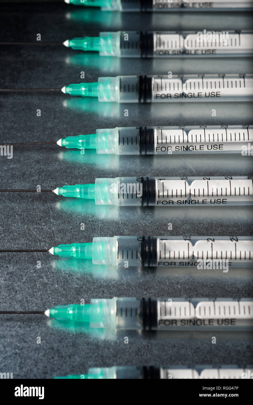 Close-up of a group of syringes Stock Photo - Alamy