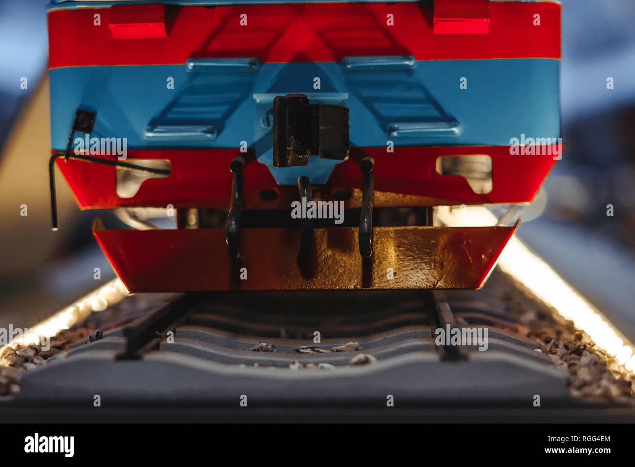 Miniature toy model of modern train crossing bridge Stock Photo - Alamy