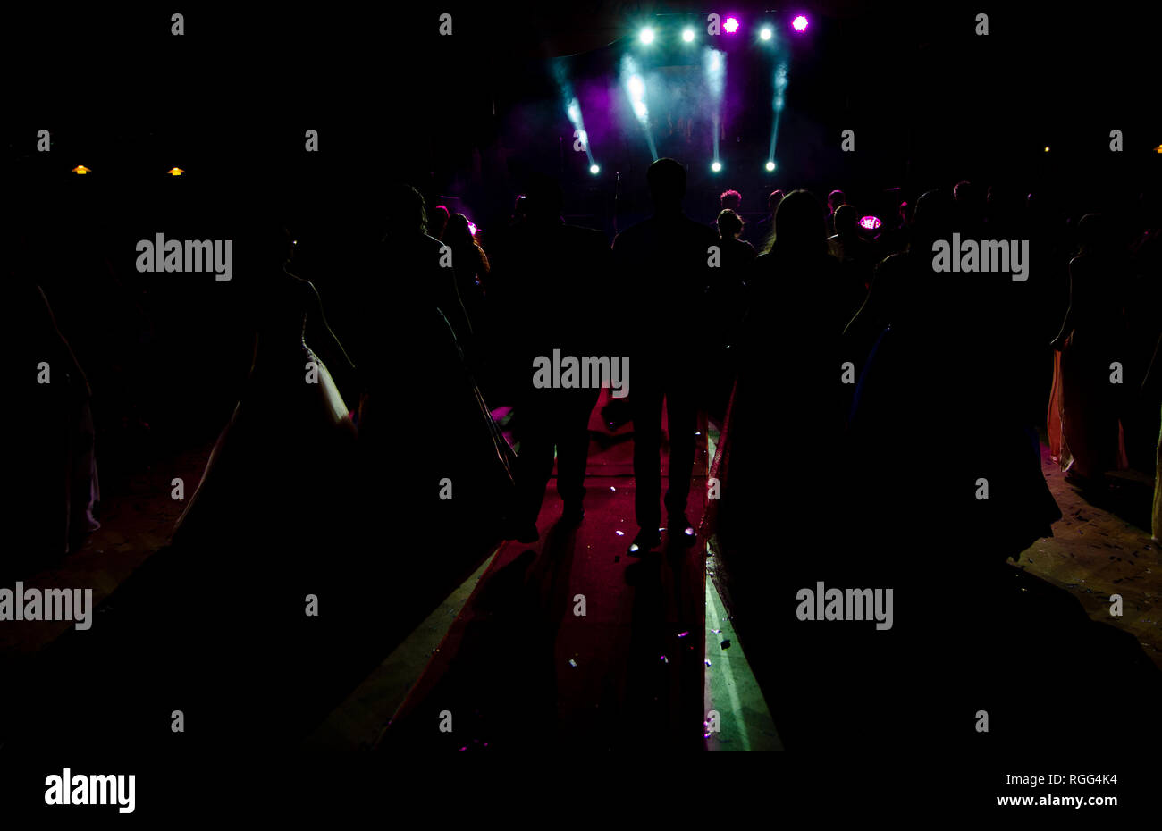 oung people dancing in shadow and lights Stock Photo - Alamy