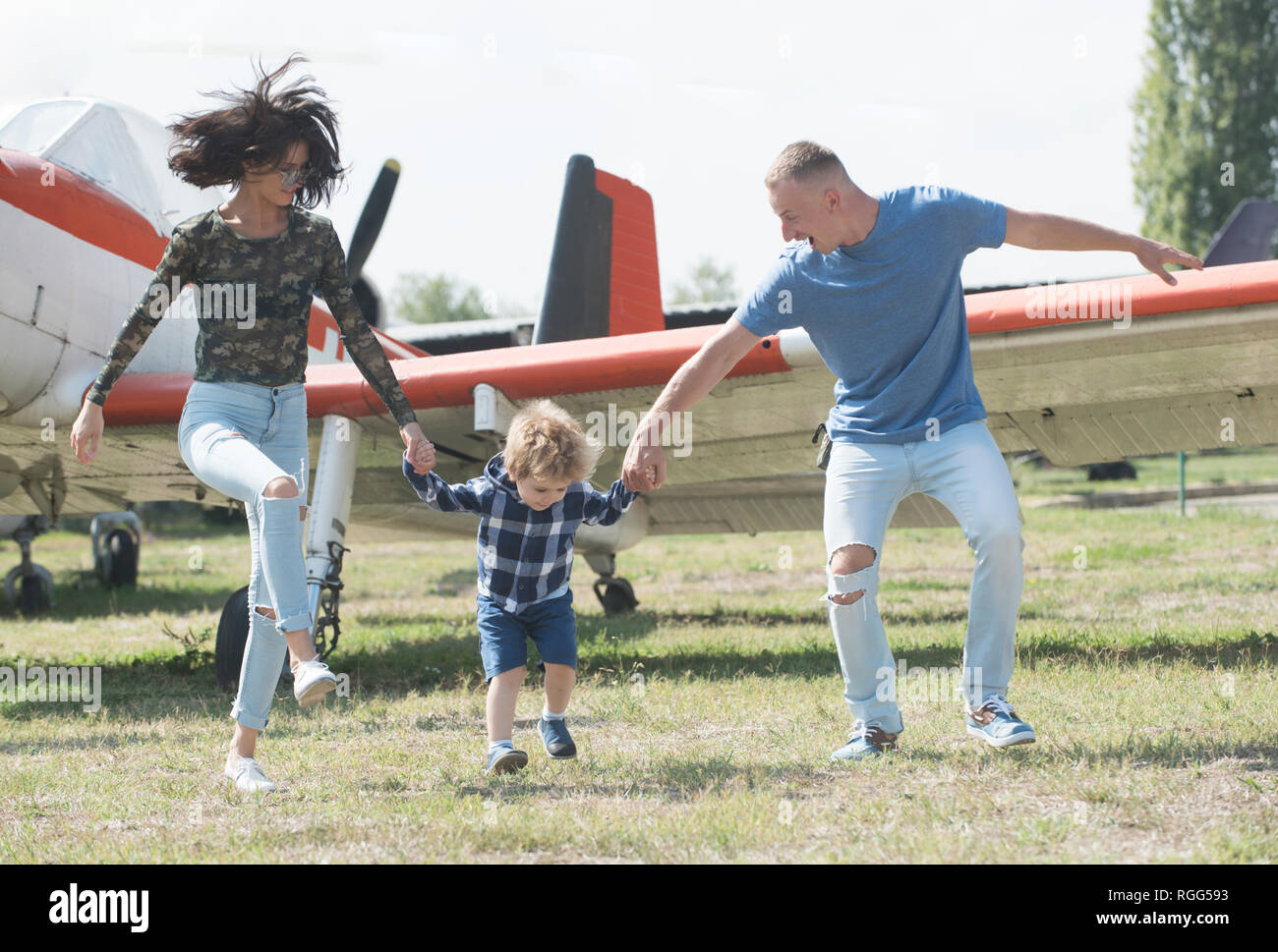 Lets start our journey. Travelling by air. Family on vacation trip ...