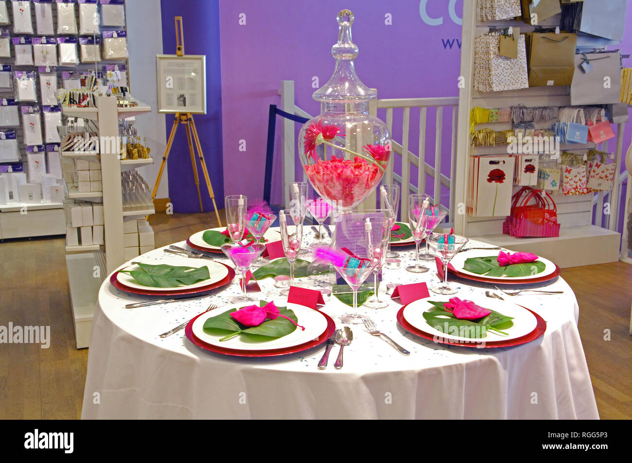 A laid table in a wedding shop Stock Photo - Alamy