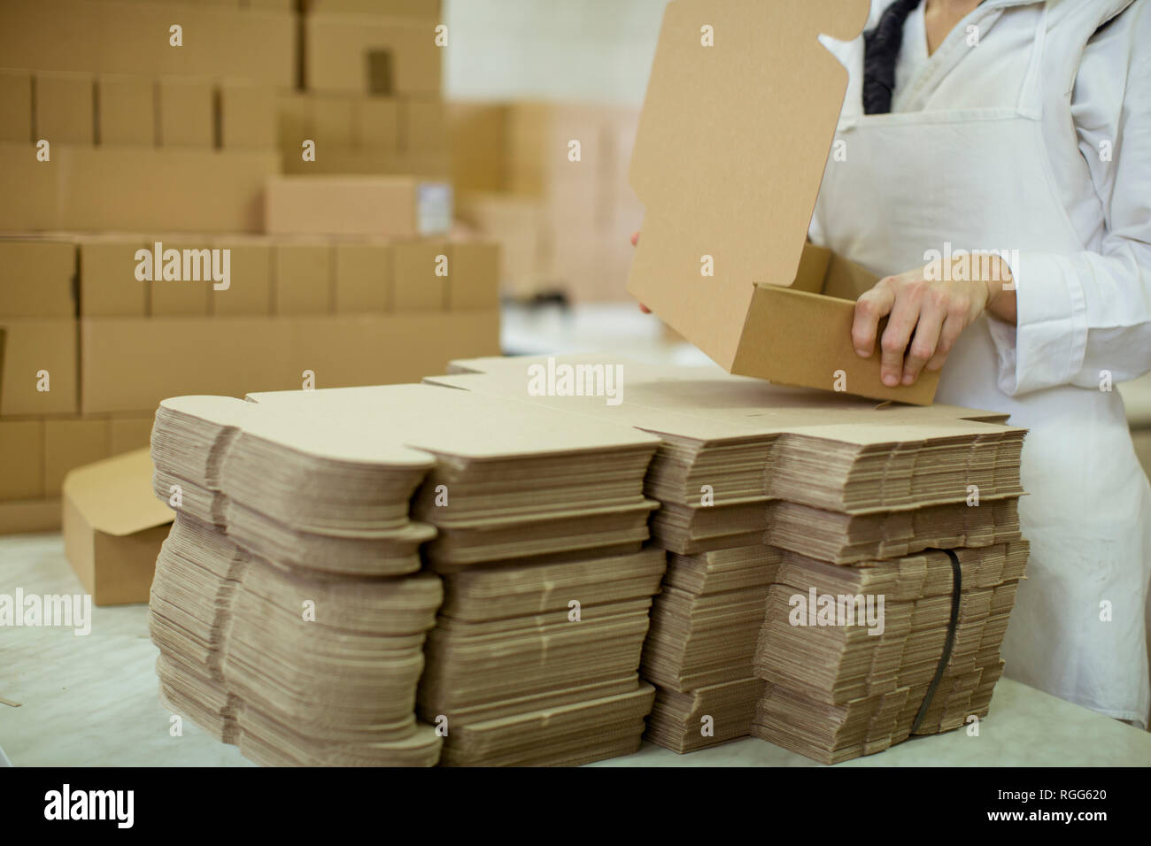 Person at work in a cookies factory Stock Photo - Alamy