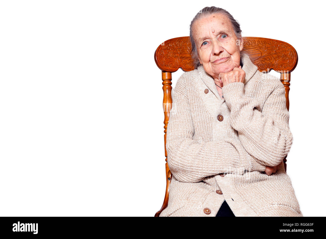 Portrait Of Gray Haired Elderly Woman Grandmother Sitting On Vintage