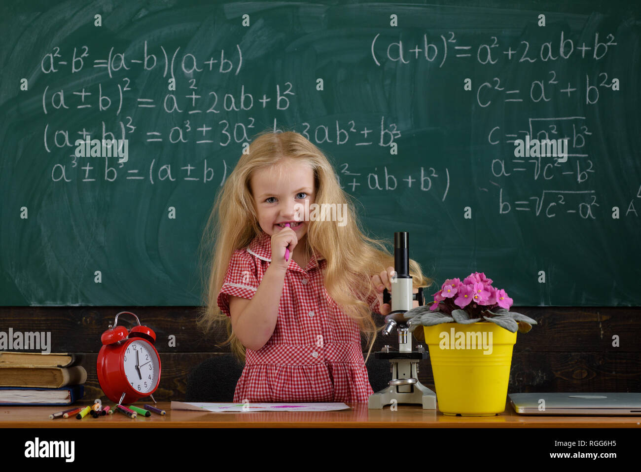 Little primary school girl have break in classroom. Child relax during ...