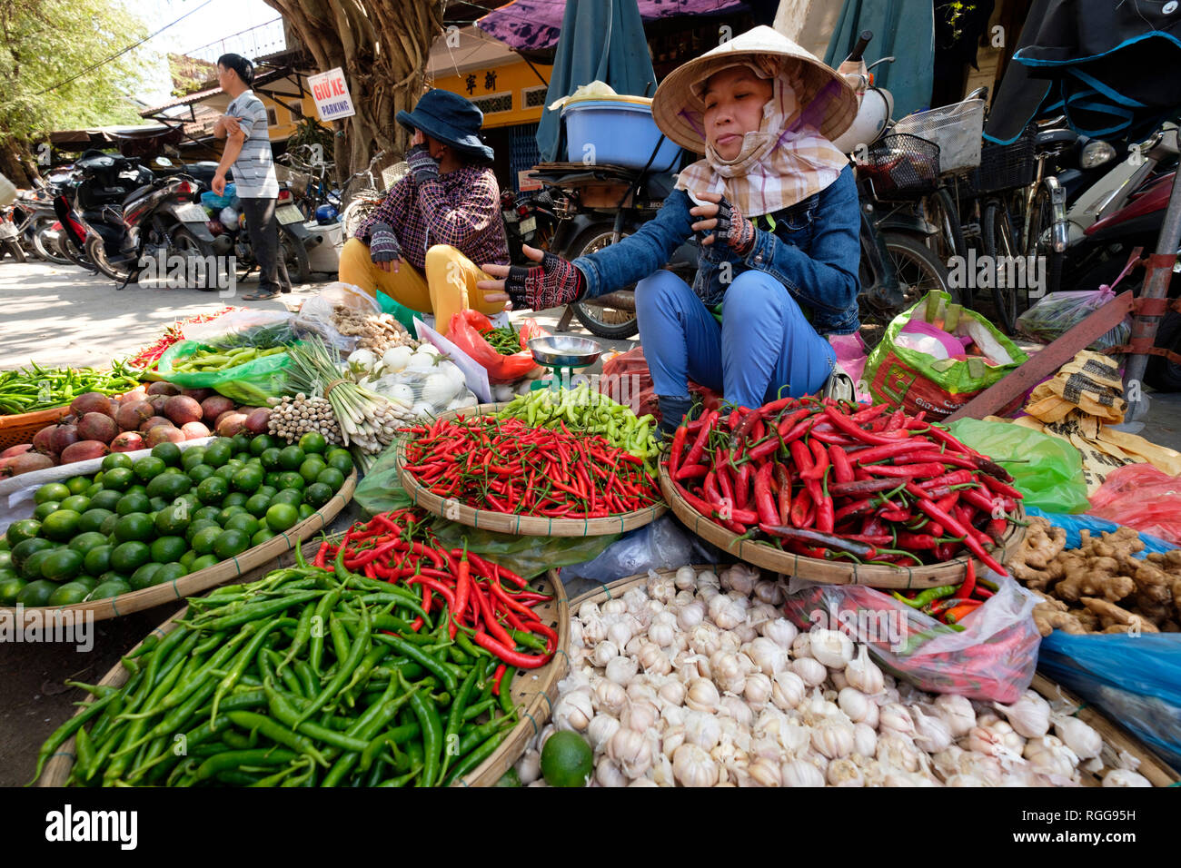 Women selling produce on the streets of Asia Stock Photo - Alamy