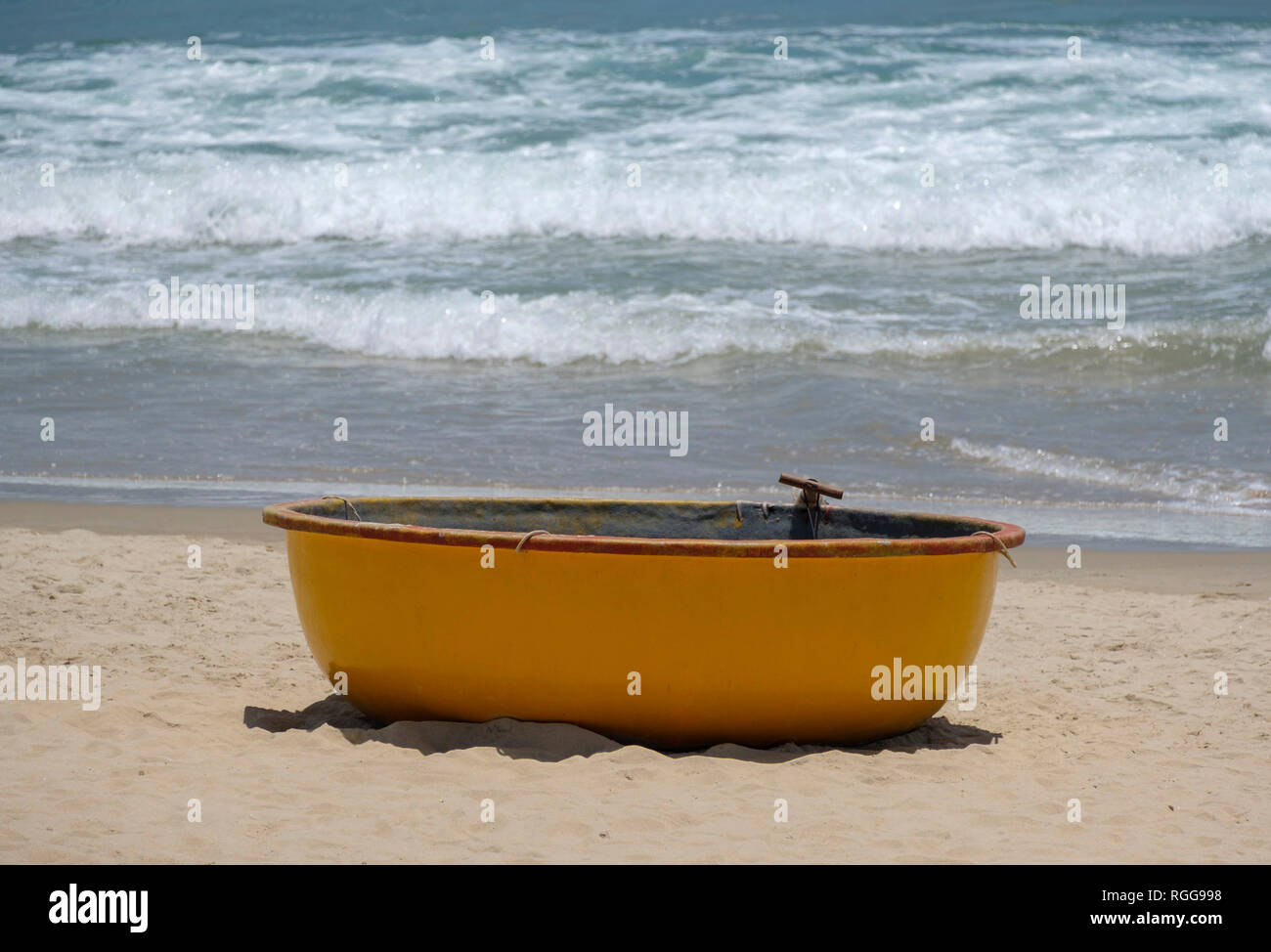 Traditional Coracle round fishing boat on a beach in Danang, Vietnam ...
