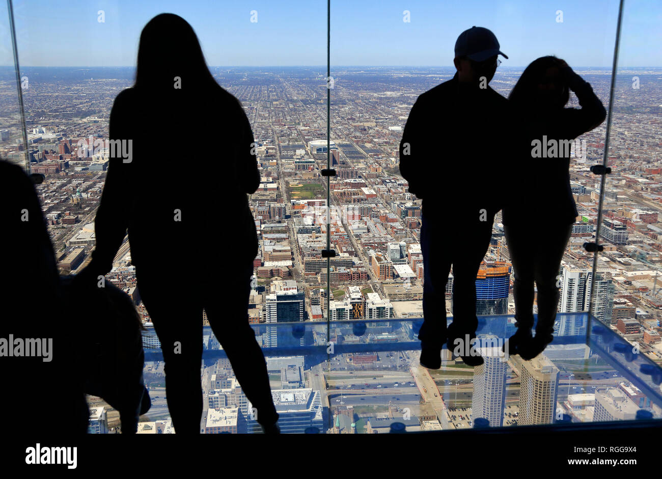 Tourists on The Ledge of the Skydeck observation deck on top of the ...