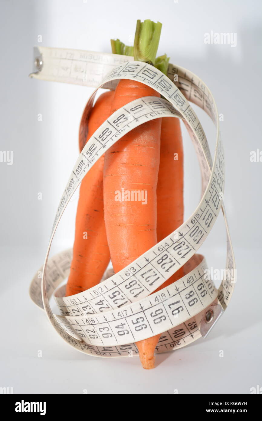 diet food and meter to measure lenght Stock Photo - Alamy