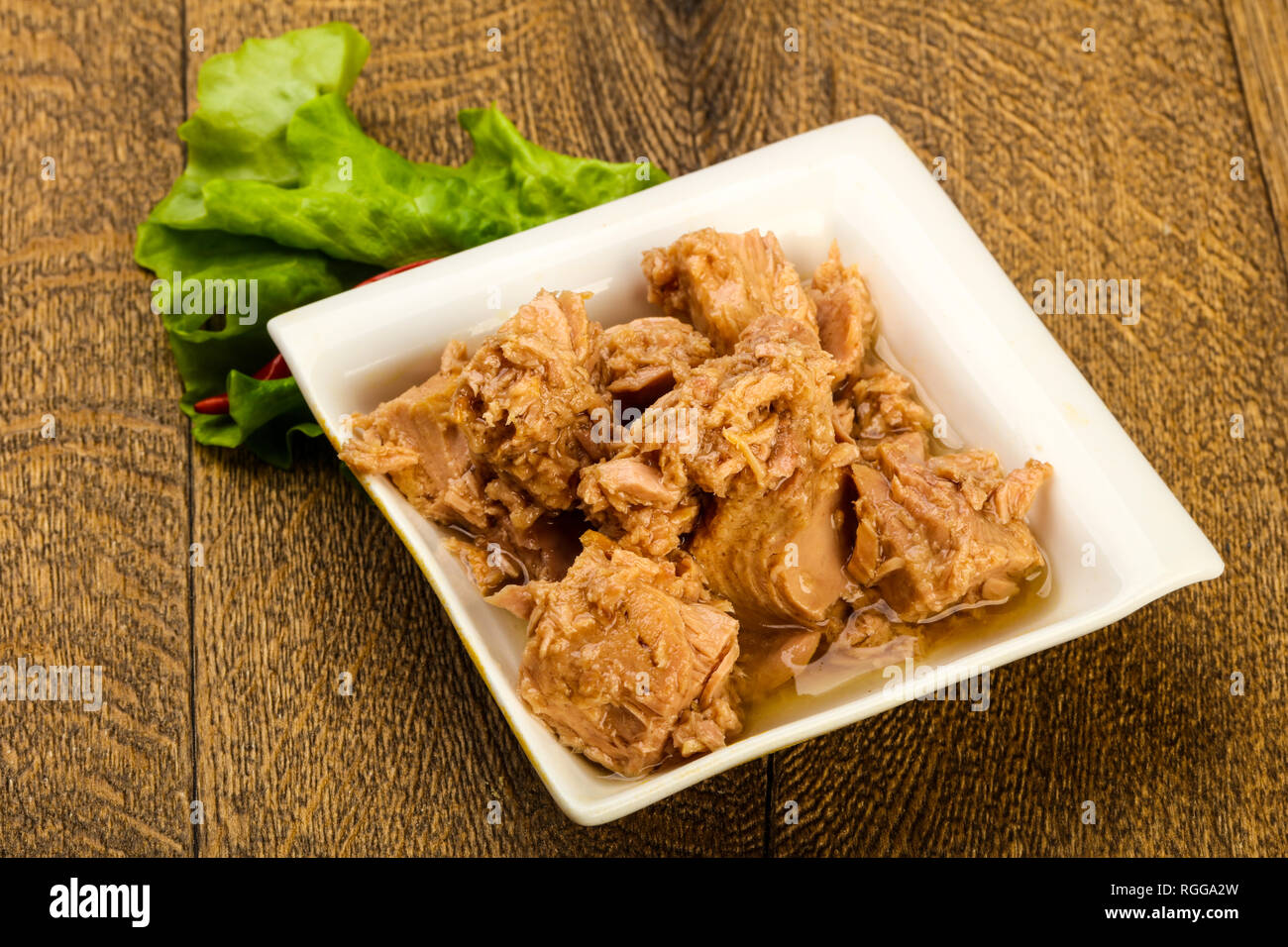 Canned tuna fish in the bowl ready for cooking Stock Photo - Alamy