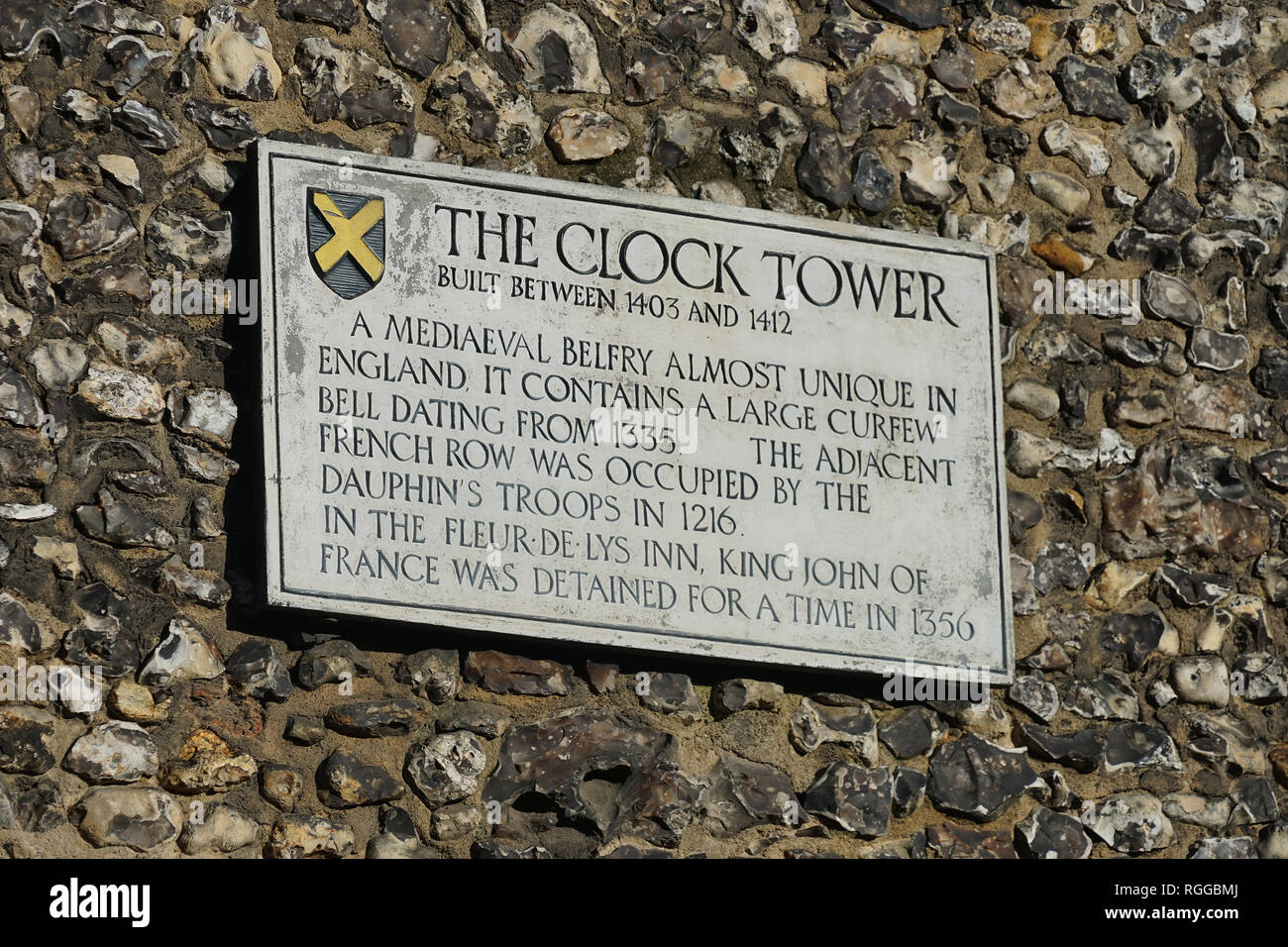 Plaque on clock tower at St Albans commemorating the location's history ...