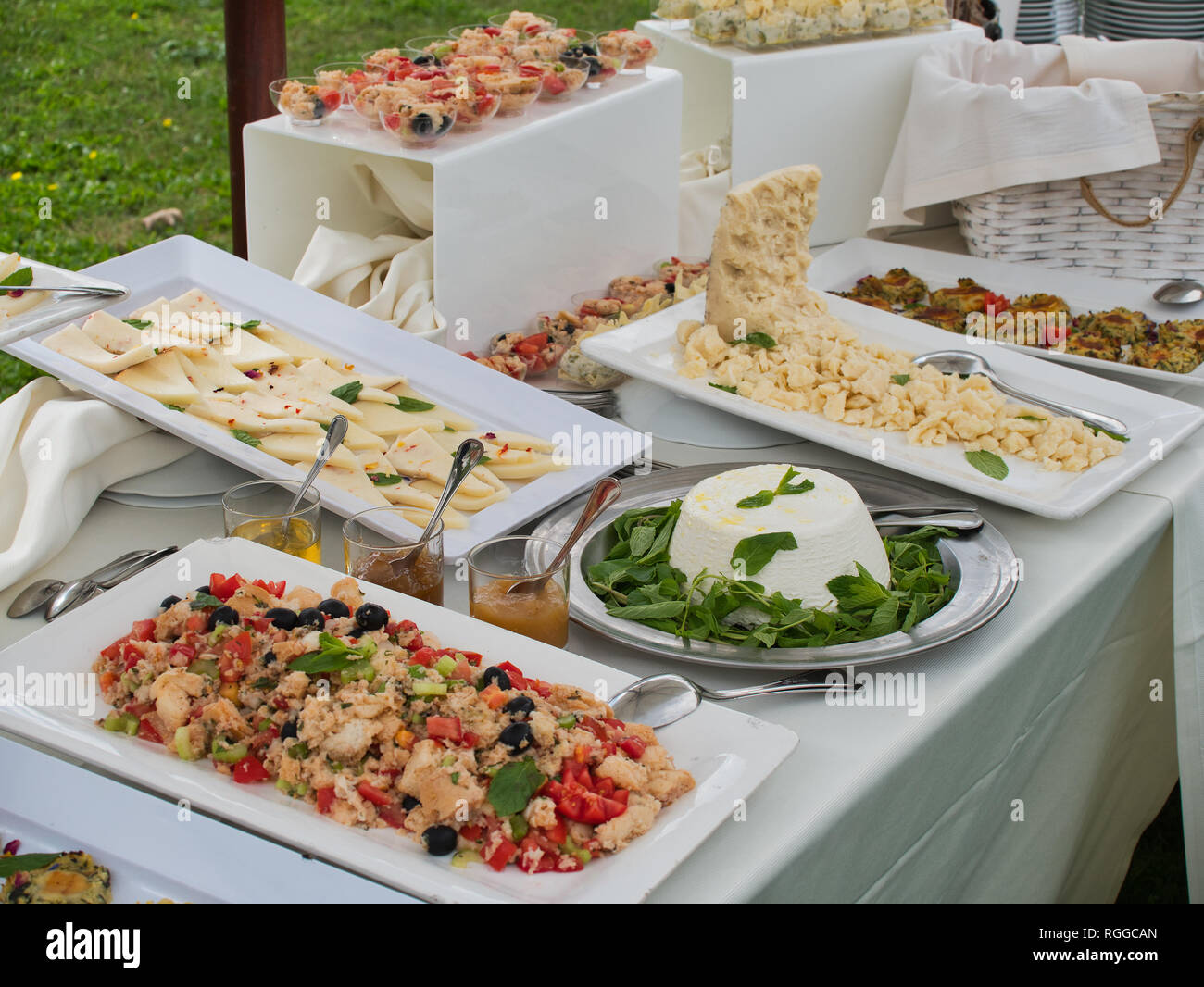 Food or buffet and table set at ceremony or event in the garden Stock ...