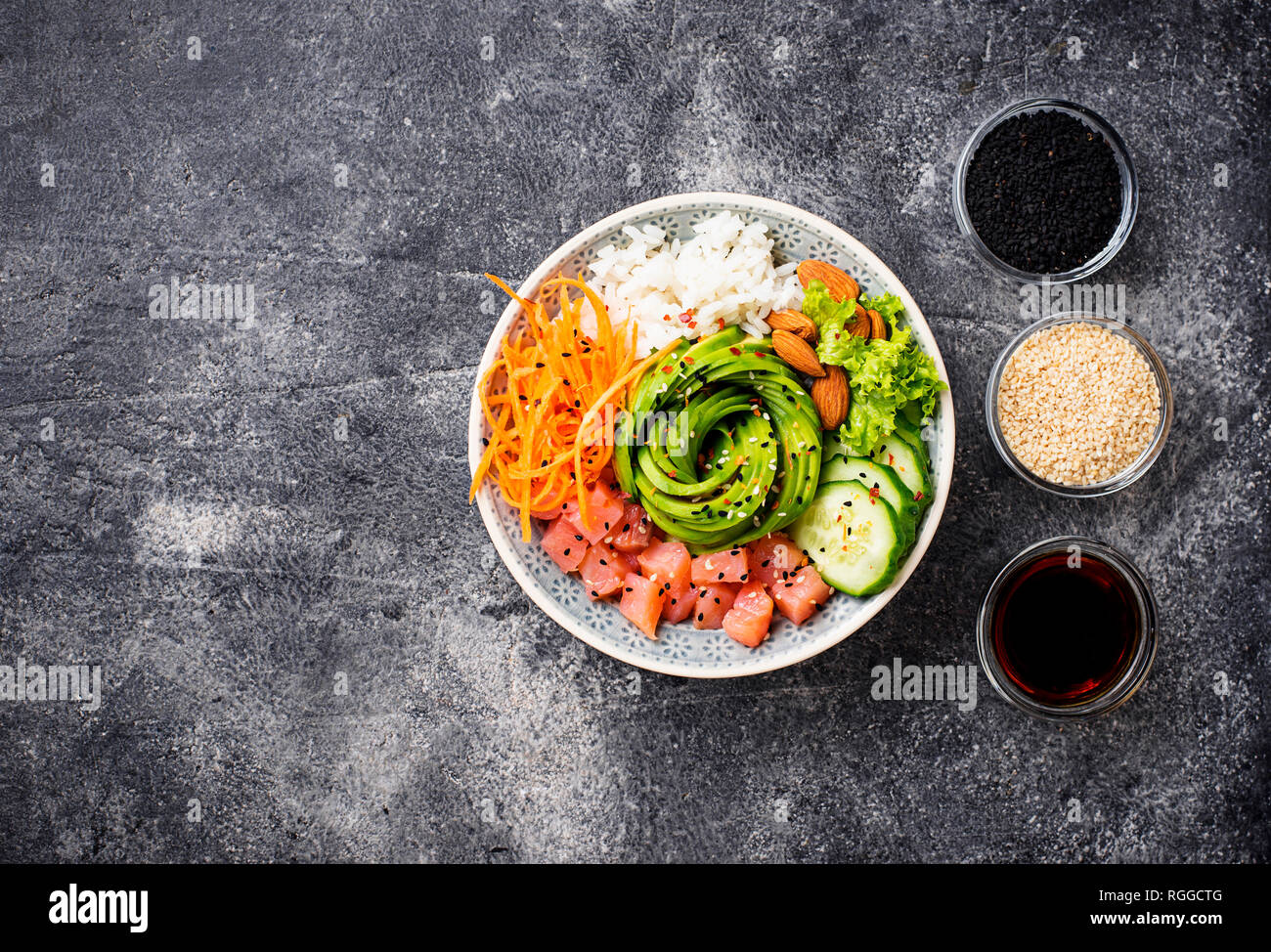Hawaiian poke bowl with salmon, rice and vegetable Stock Photo - Alamy