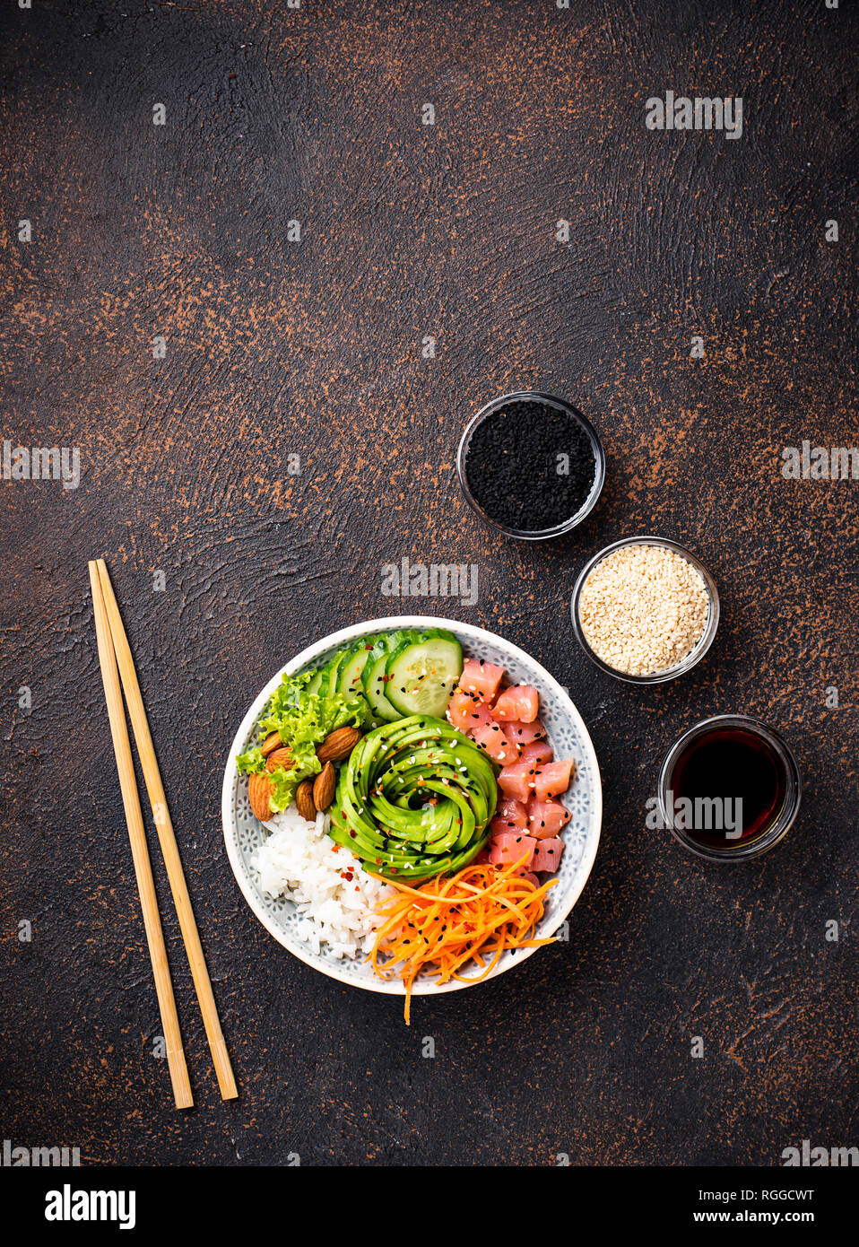 Hawaiian poke bowl with salmon, rice and vegetable Stock Photo - Alamy