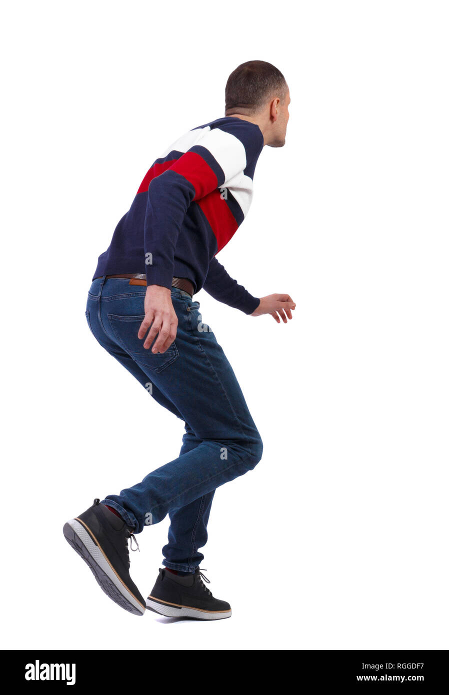 Back view of a running man in sweater. backside view of person. Rear ...