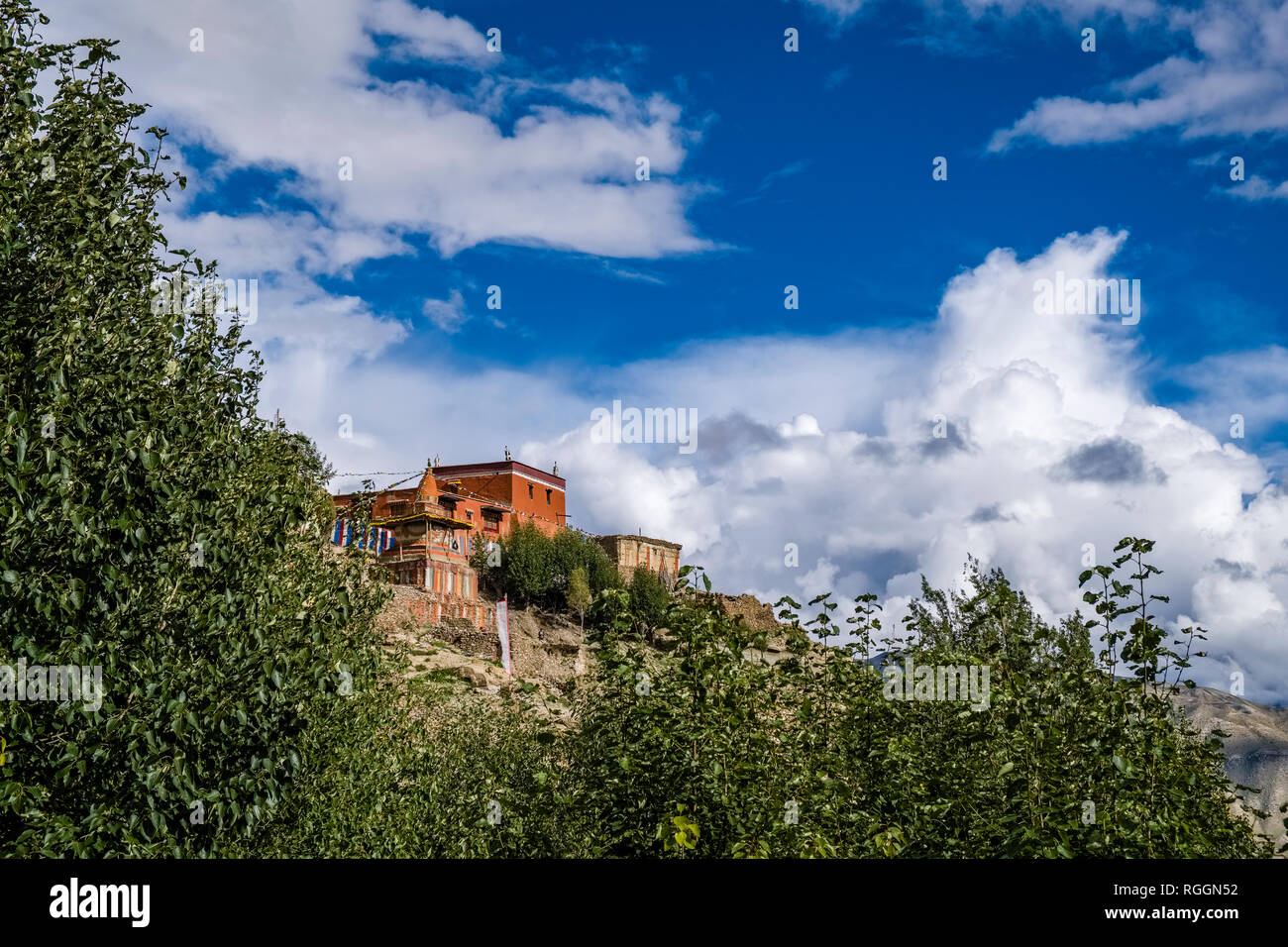 The monastery of village is located on a hill in Upper Mustang Stock ...