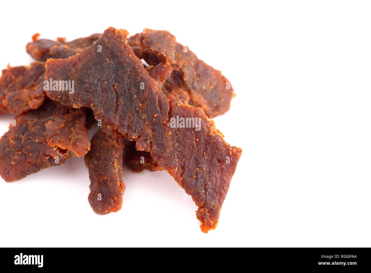 A Pile of Mild Flavored Beef Jerky on a White Background Stock Photo ...