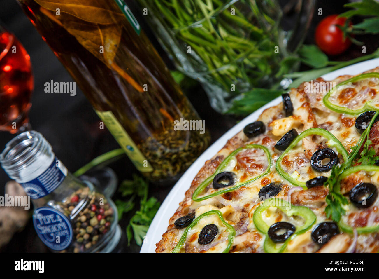 Supreme Pizza lifted slice 1 Stock Photo - Alamy
