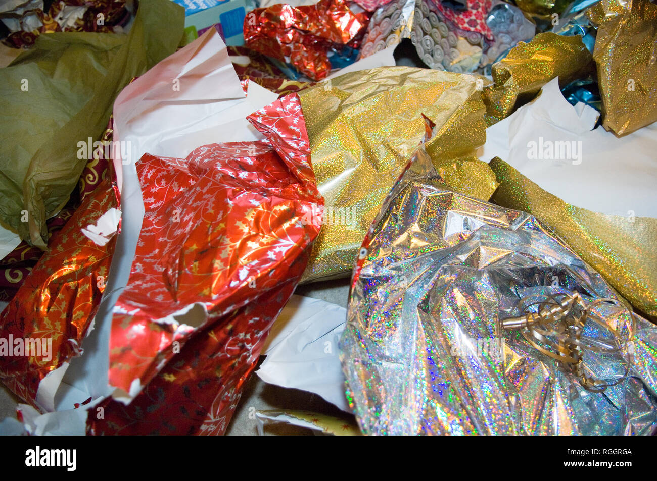 Pile of used Christmas paper Stock Photo - Alamy