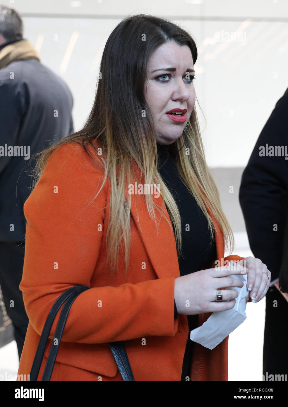 Laura Plummer prepares to read a statement at Heathrow Airport ...