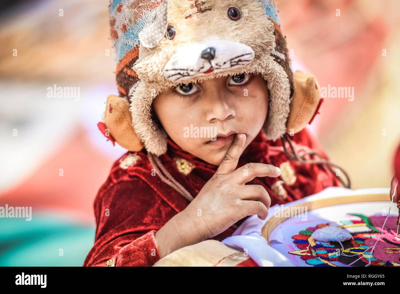 Child with cap hi-res stock photography and images - Alamy