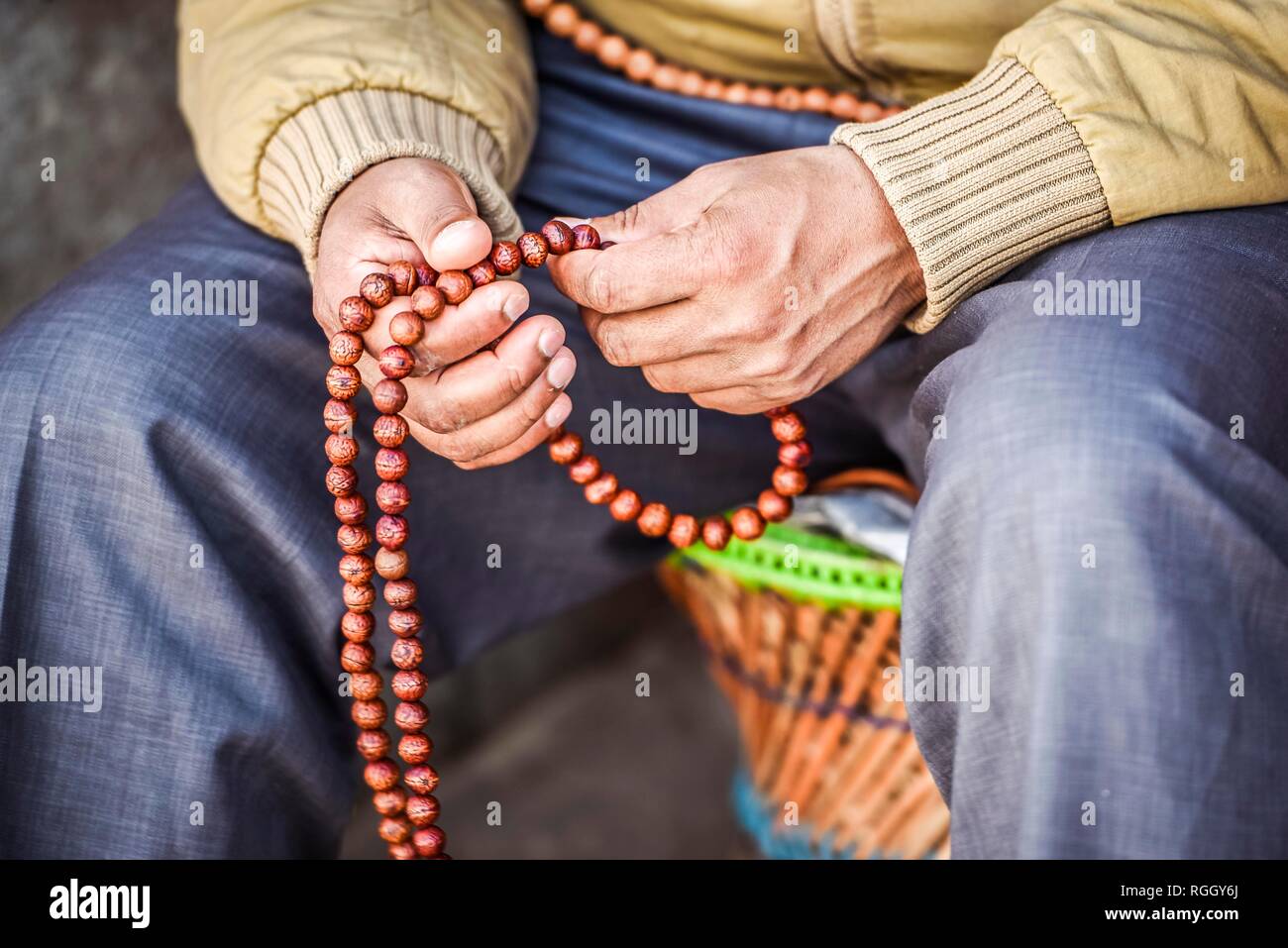 Hands with Buddhist prayer chain, Mala, Boudha, Kathmandu, Nepal Stock ...