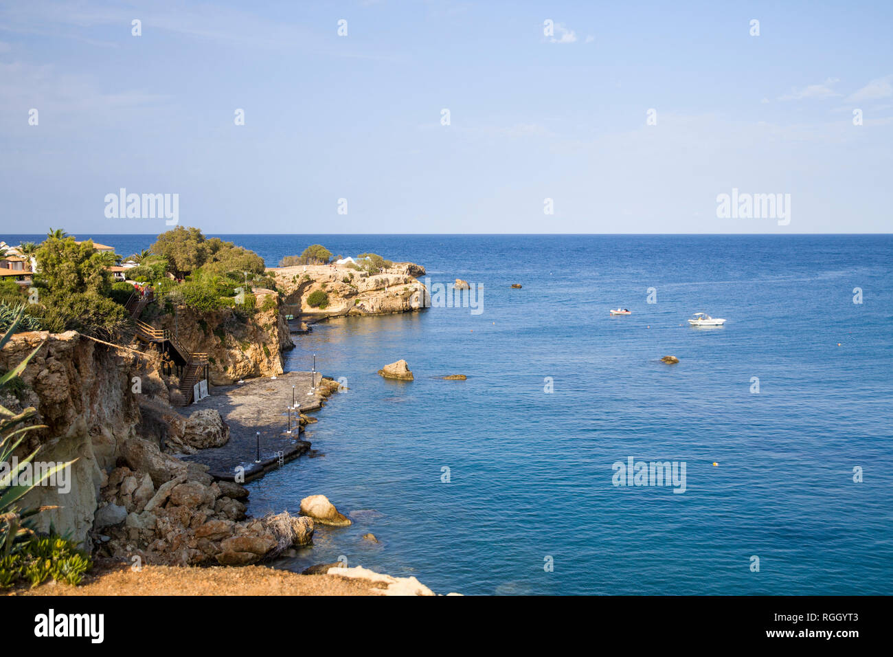 The rocks are in contact with the sea. Rocky beach, sharp rocks ...