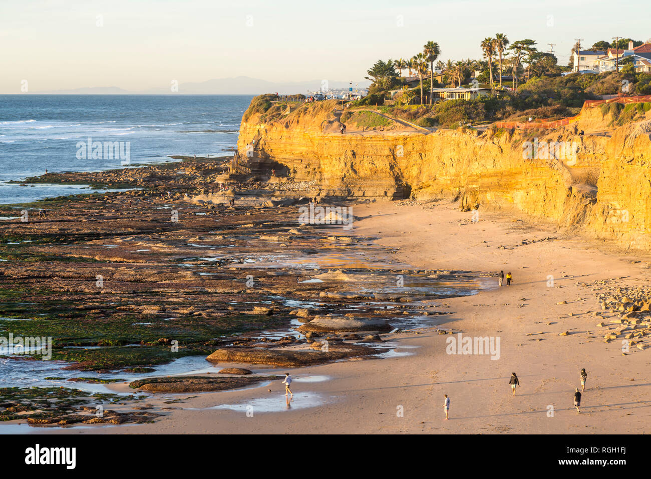 People on North Garbage Beach on a January afternoon. Sunset Cliffs ...