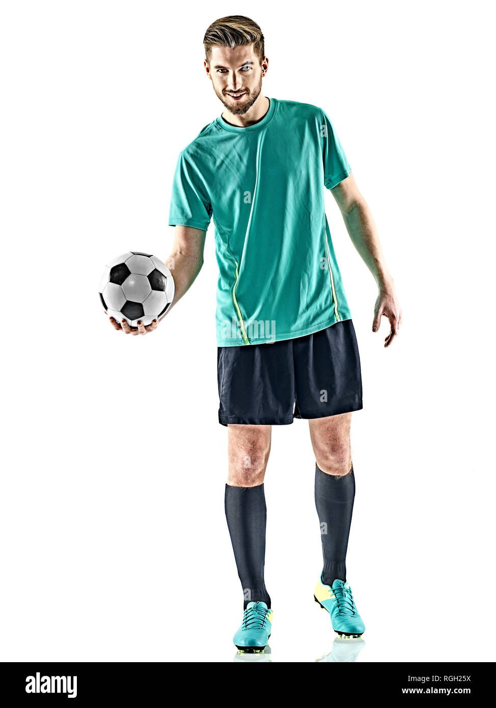 one caucasian soccer player man standing holding football isolated on ...