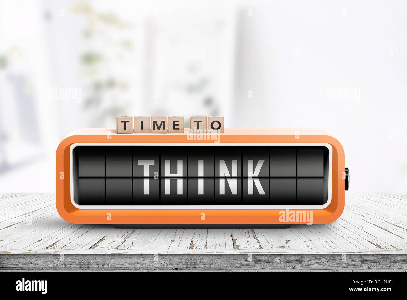 Time to think text on an old alarm clock in a bright room on a table ...
