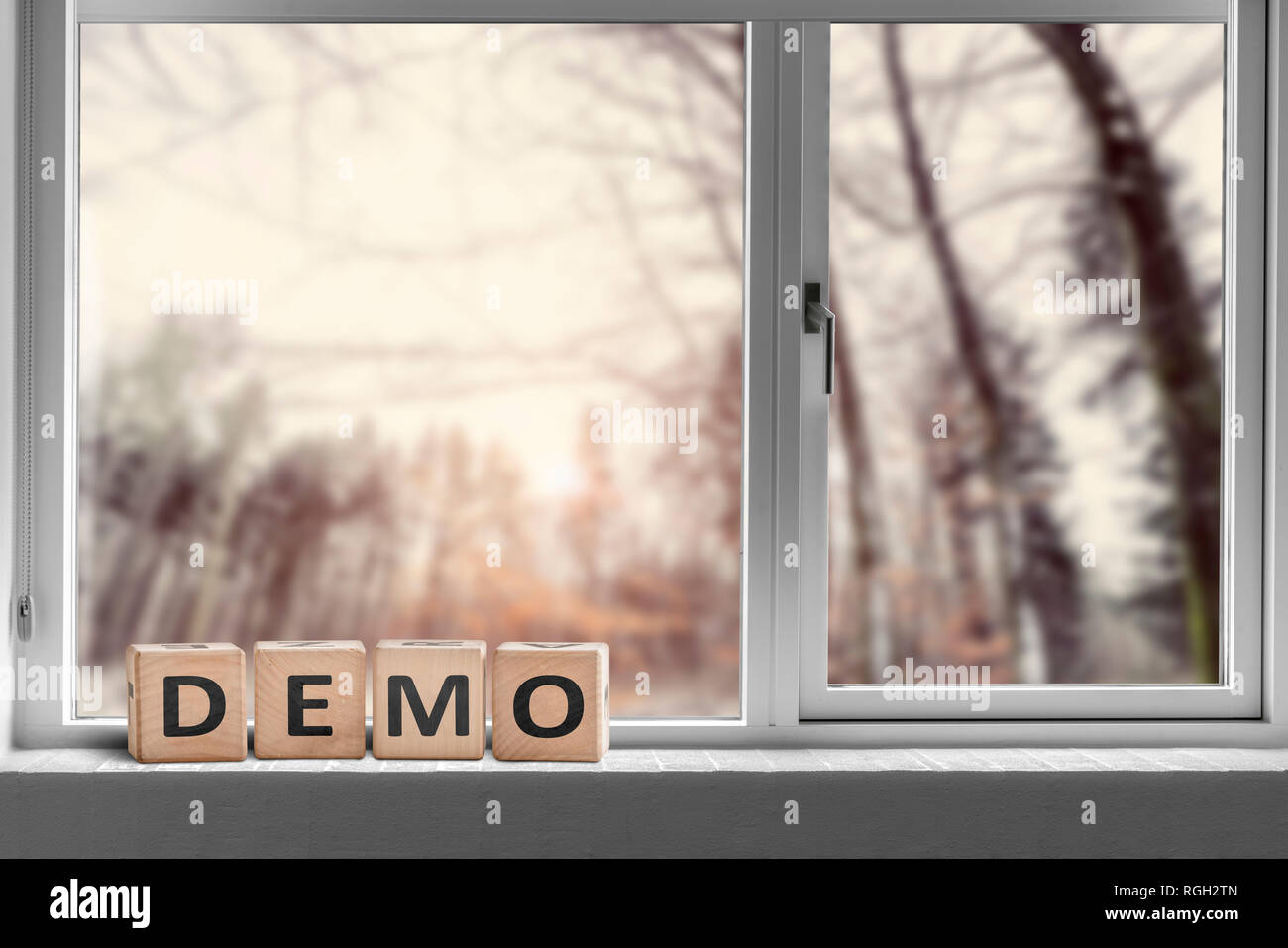 Demo sign in a window with a view to a forest in the morning Stock ...