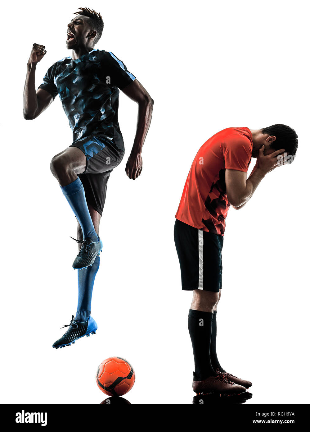 two soccer players men in studio silhouette isolated on white ...