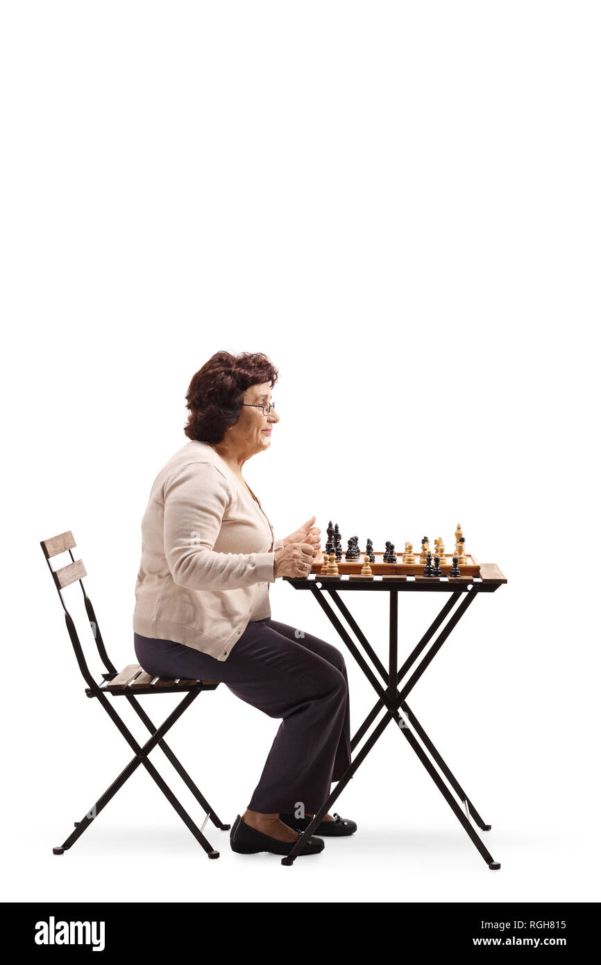 Old lady playing chess hi-res stock photography and images - Alamy