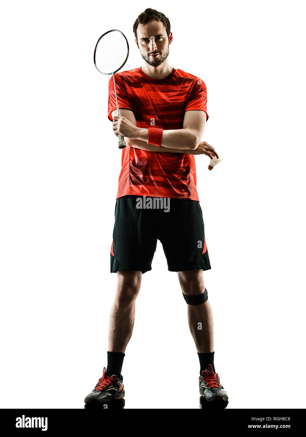 one caucasian Badminton player man in studio shadow silhouette isolated ...