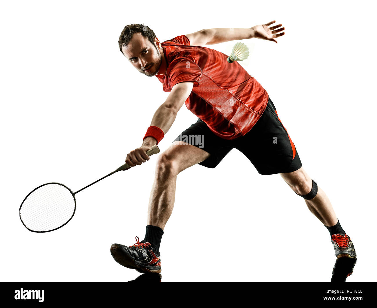 one caucasian Badminton player man in studio shadow silhouette isolated ...