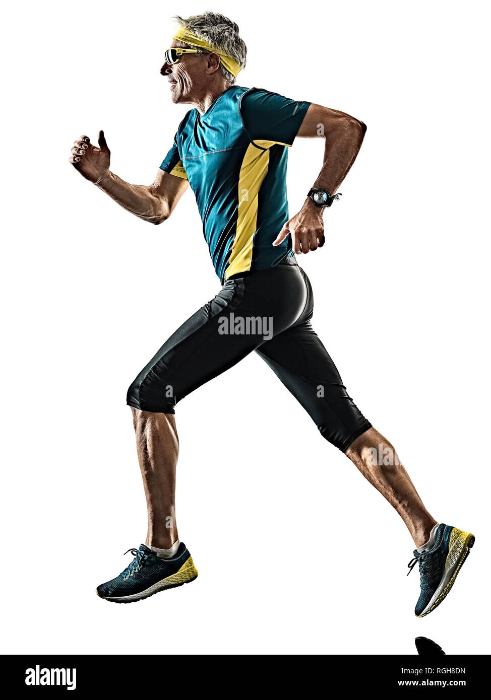 one caucasian senior man running runner jogger jogging in studio shadow ...