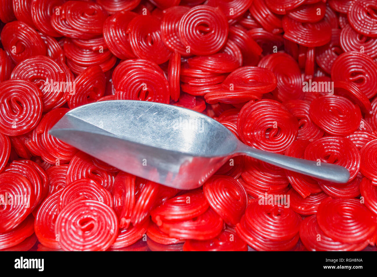 Red Twisted Spiral Jelly you can buy ina candy store Stock Photo - Alamy