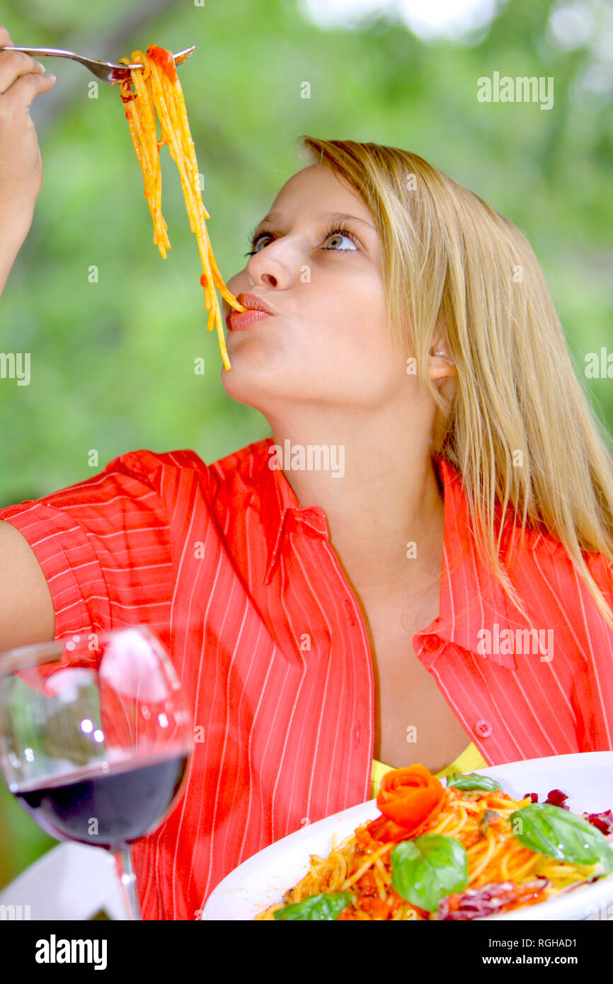 Woman eating spaghetti italy hi-res stock photography and images - Alamy