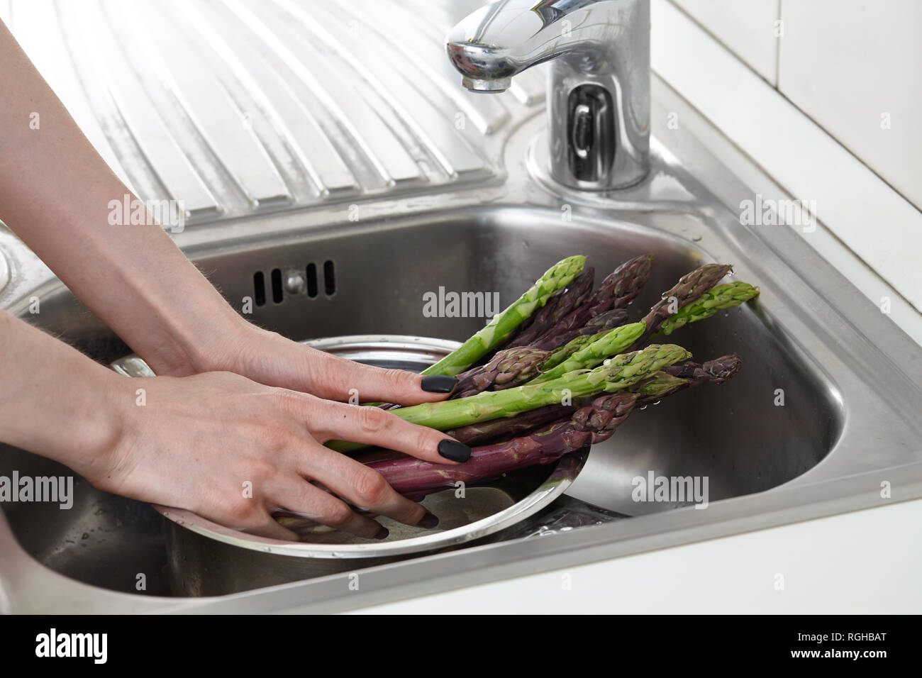 Woman cooking pot cleaning hi-res stock photography and images - Alamy
