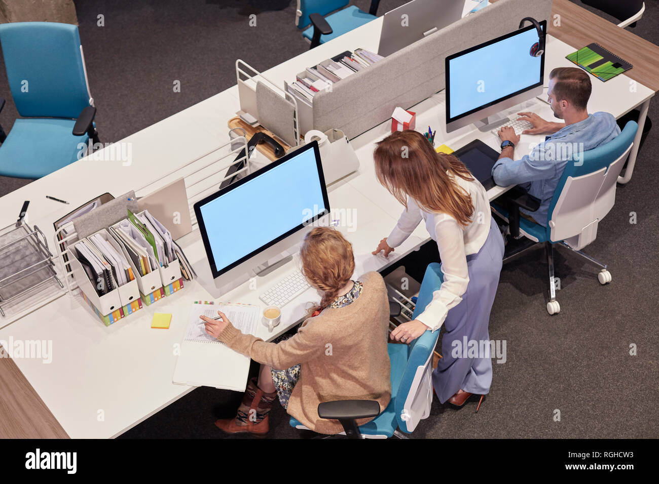 People working in big modern office Stock Photo - Alamy